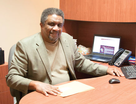 Brian Rock passes baton to Linton Garner